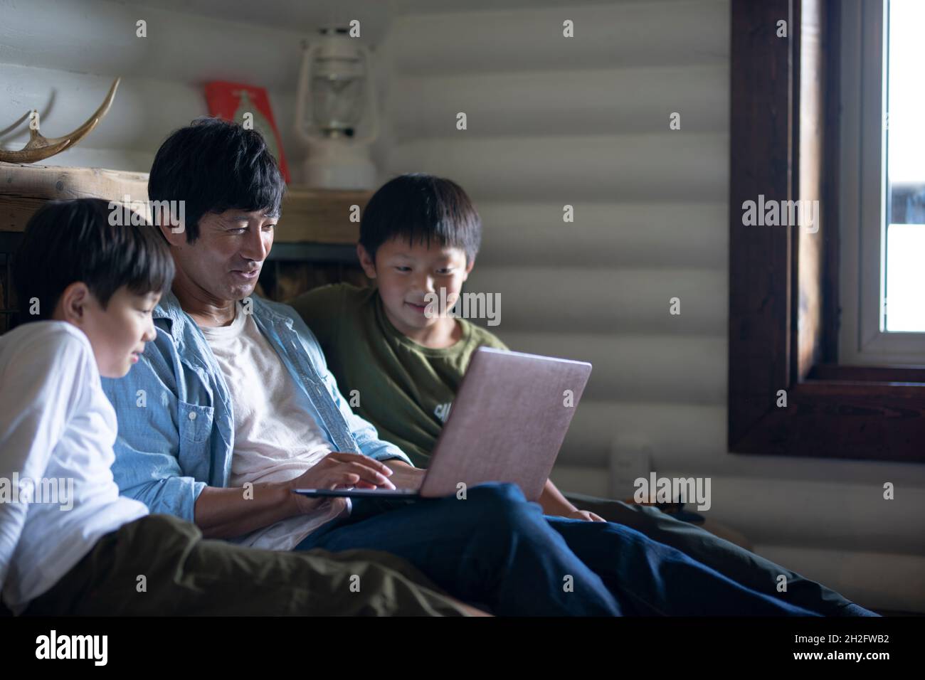 Father and Son Watching PC Stock Photo - Alamy