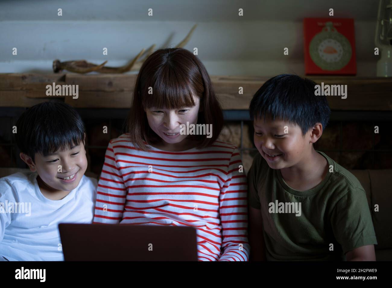 Mother and Son Watching PC Stock Photo - Alamy