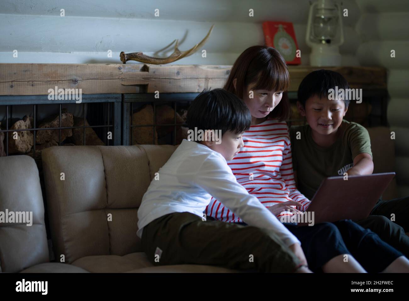 Mother and Son Watching PC Stock Photo - Alamy