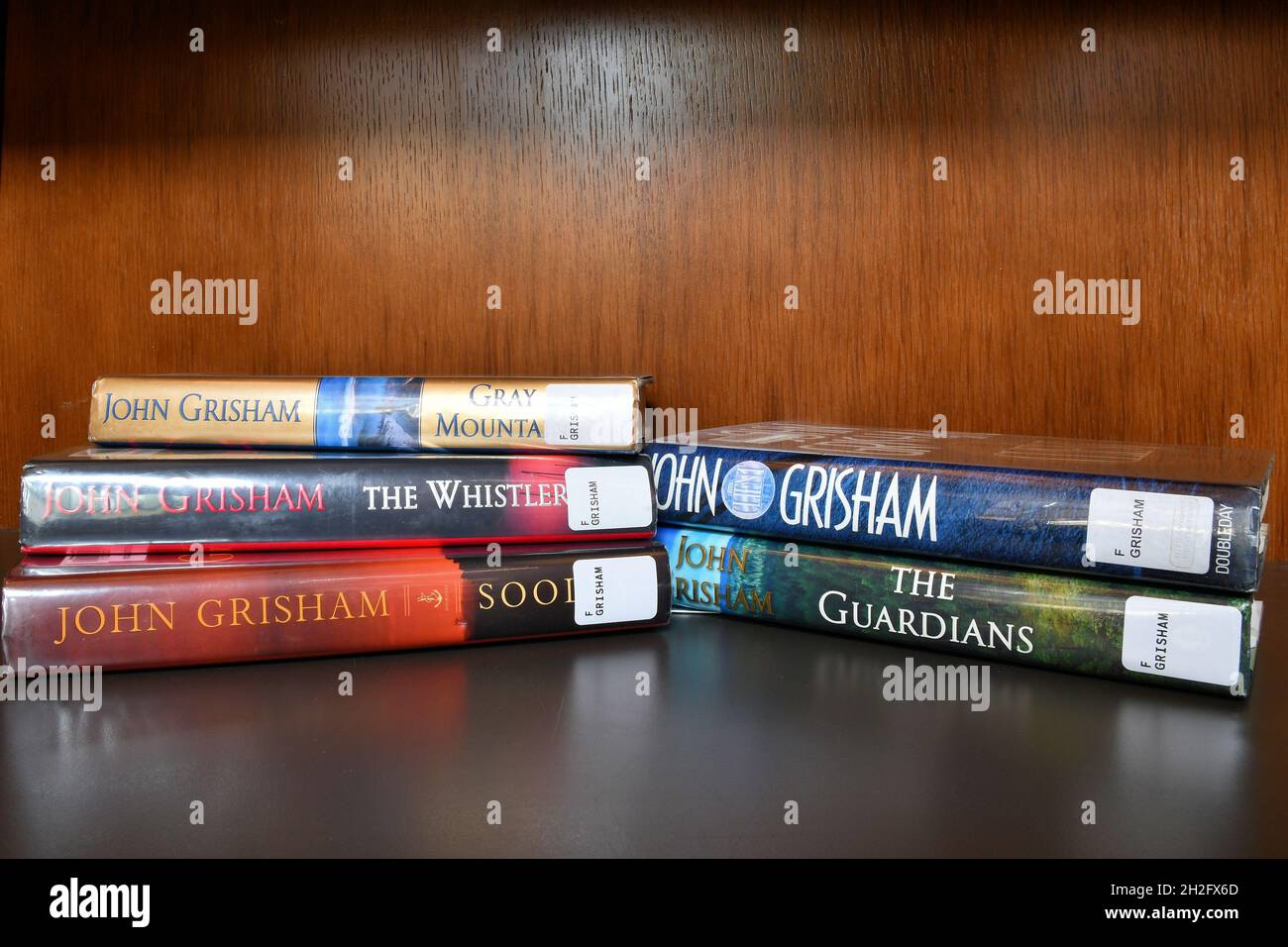Assorted novels by American author John Grisham displaying the Dewey ...