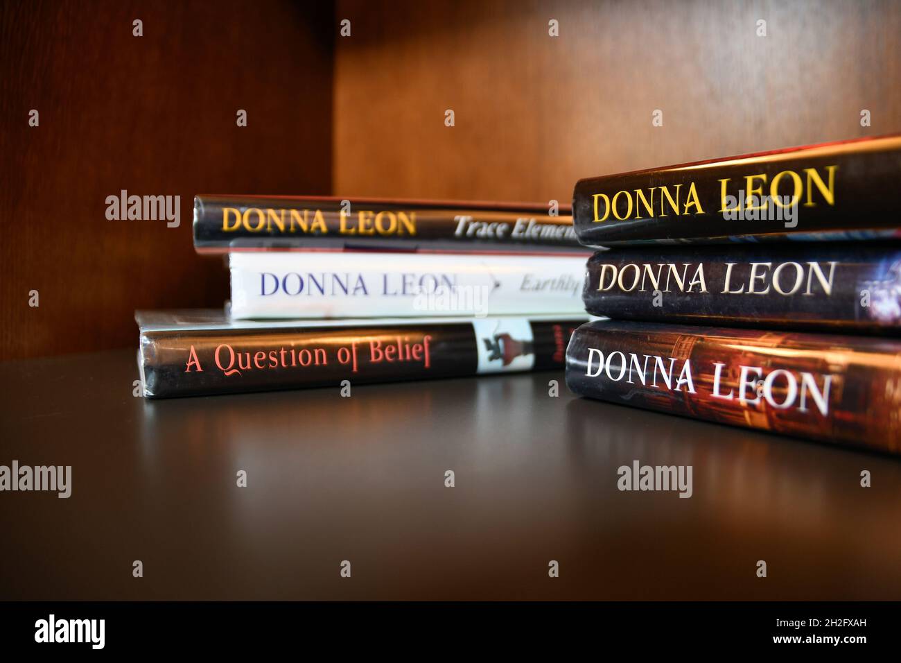 Assorted crime fiction by Donna Leon with a library's Dewey Decimal ...