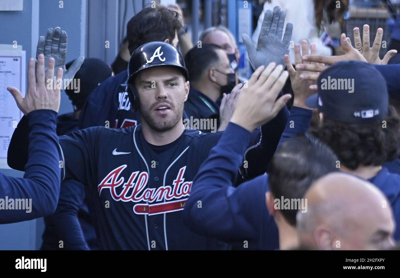High fives teammates in the dugout hi-res stock photography and images ...