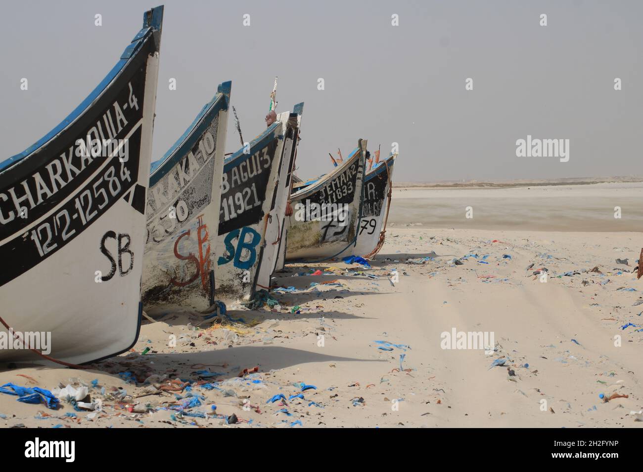 Fishing boats on beach near Dakhla, western Sahara, Morocco Stock Photo ...