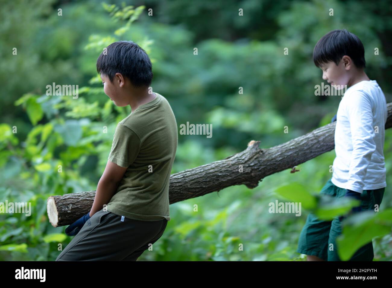 Elementary school student carrying hi-res stock photography and images ...