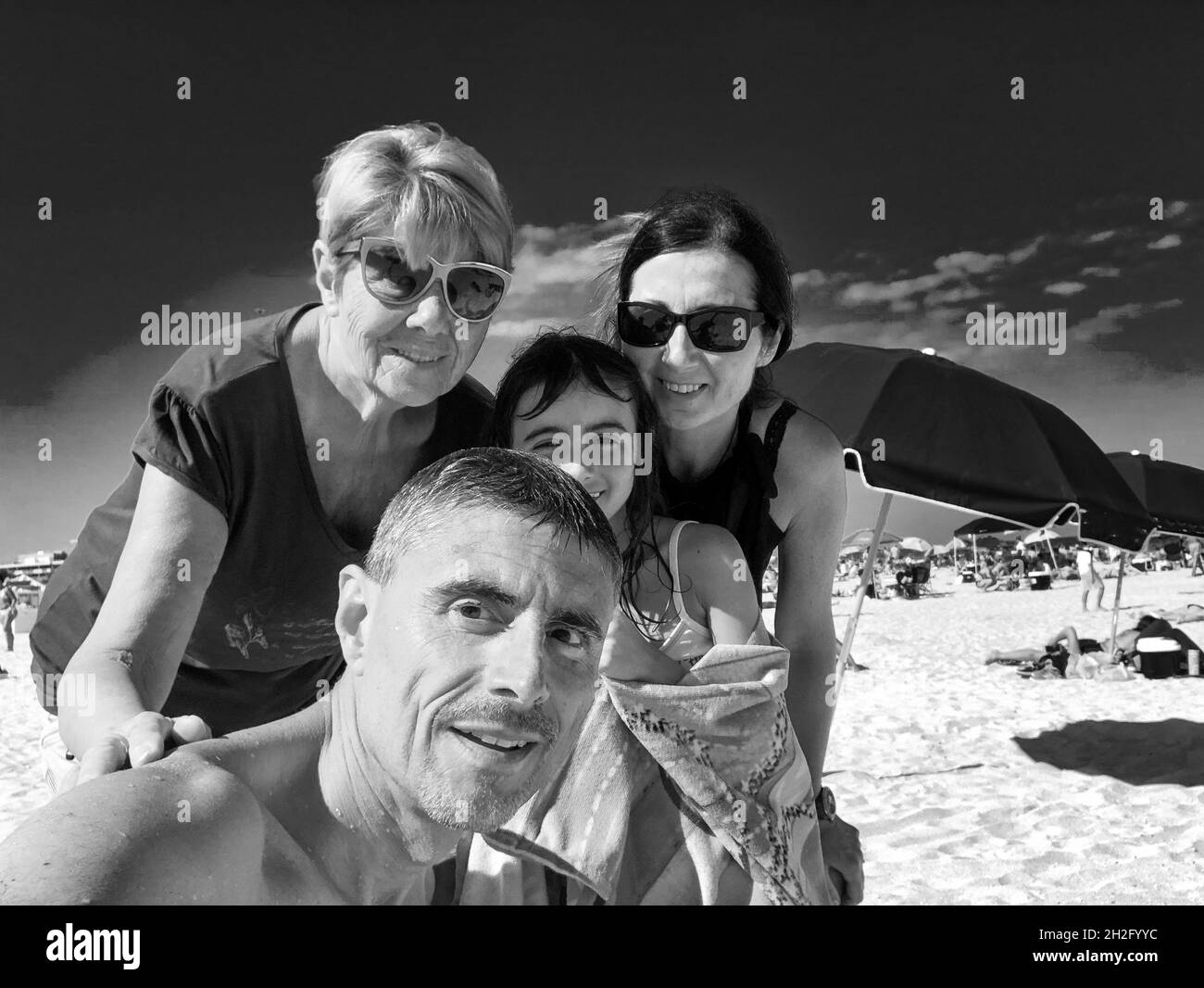 Family summer beach Black and White Stock Photos & Images - Alamy