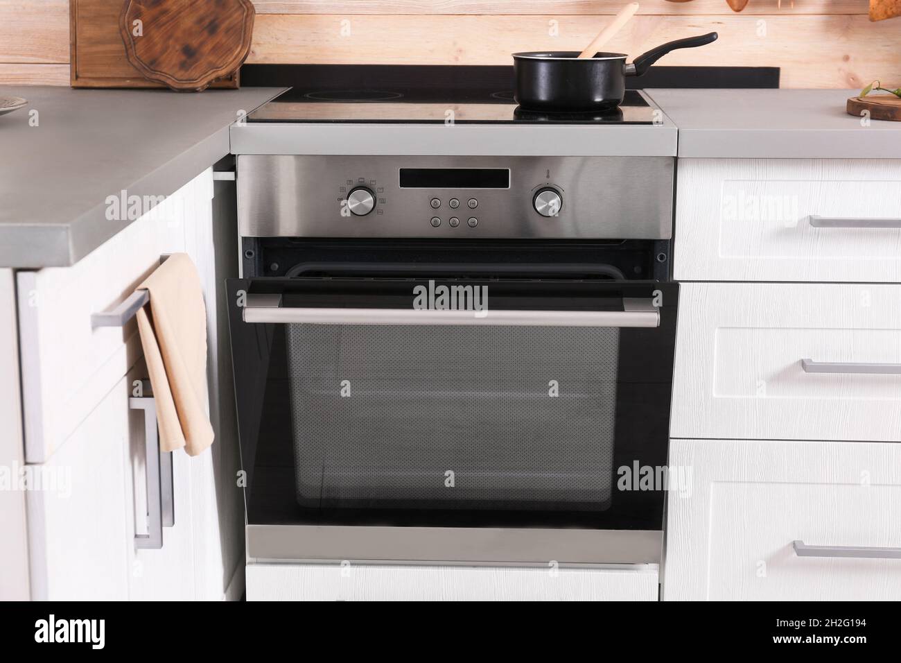 Open modern oven built in kitchen furniture Stock Photo - Alamy