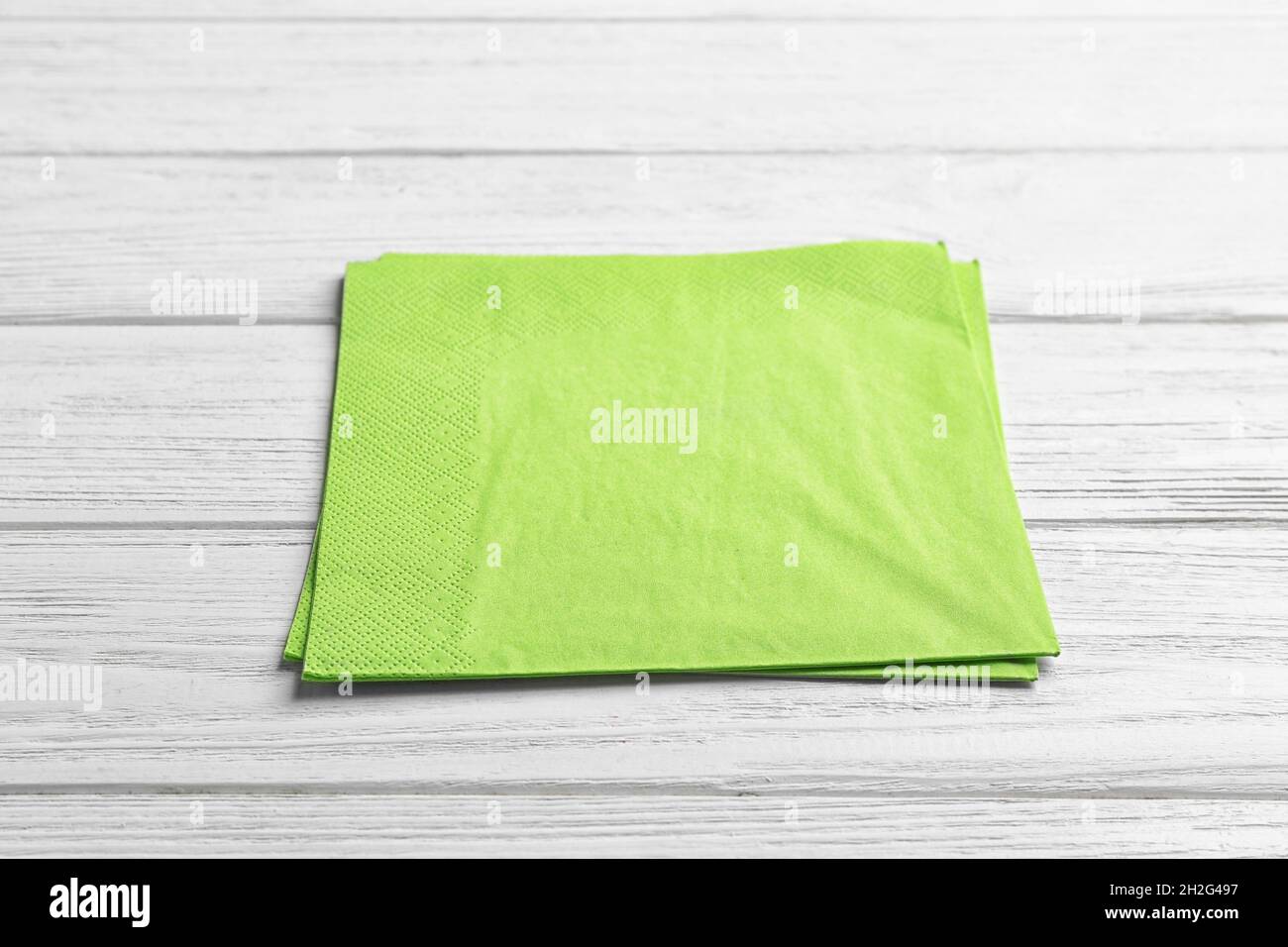 Clean napkins on wooden background. Personal hygiene Stock Photo - Alamy