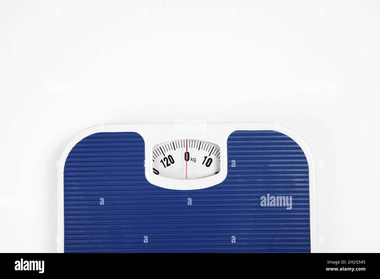 Modern scales isolated on white, top view Stock Photo - Alamy