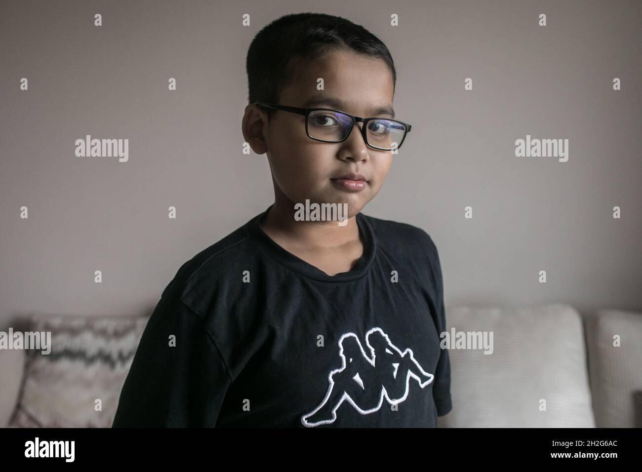 A child seen posing for photos in a living room. (Photo by Sazzad Hossain / SOPA Images/Sipa USA ...