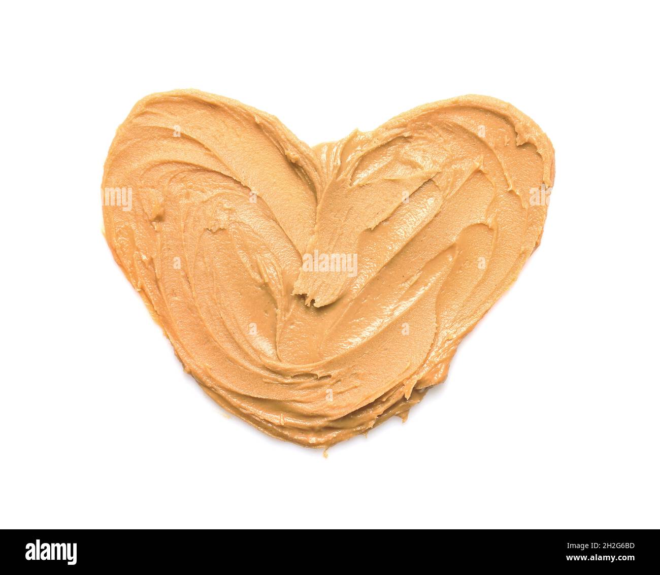 Heart made of peanut butter on white background Stock Photo - Alamy