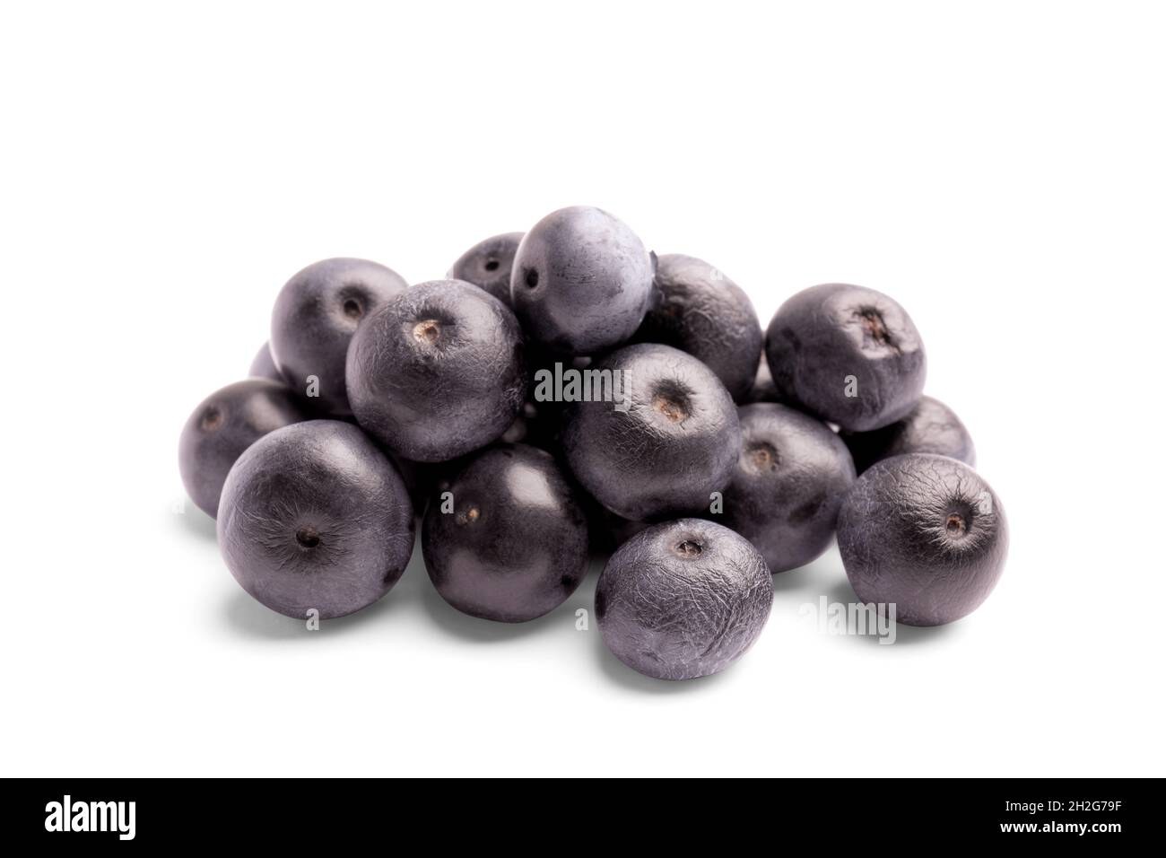 Fresh acai berries on white background Stock Photo - Alamy