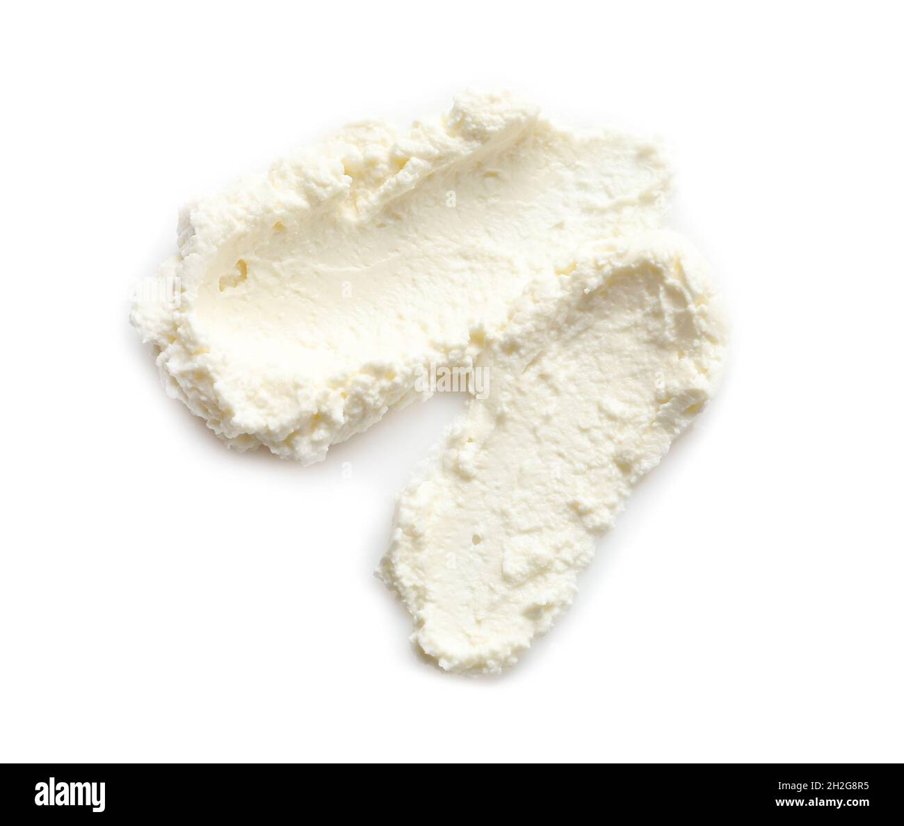 Smears of tasty cream cheese on white background, top view Stock Photo ...