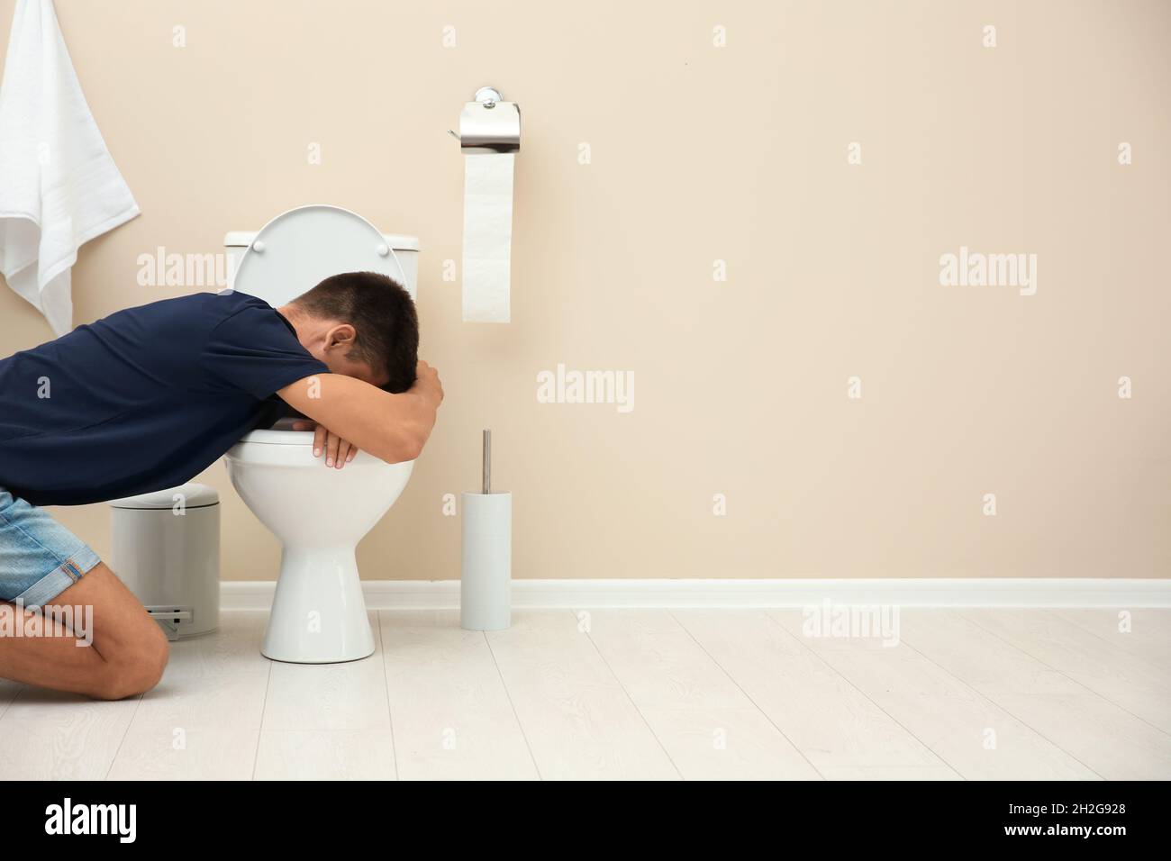 Young man drunk sick vomiting High Resolution Stock Photography and ...