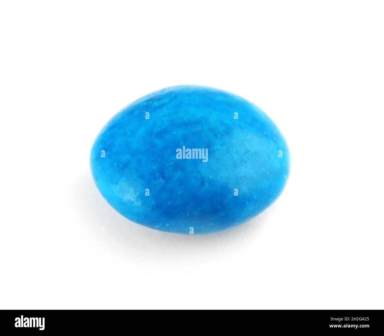 Small blue chocolate candy on white background Stock Photo - Alamy