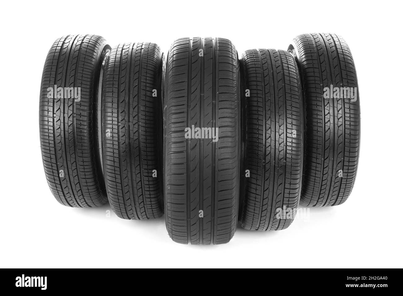 Car tires on white background Stock Photo - Alamy
