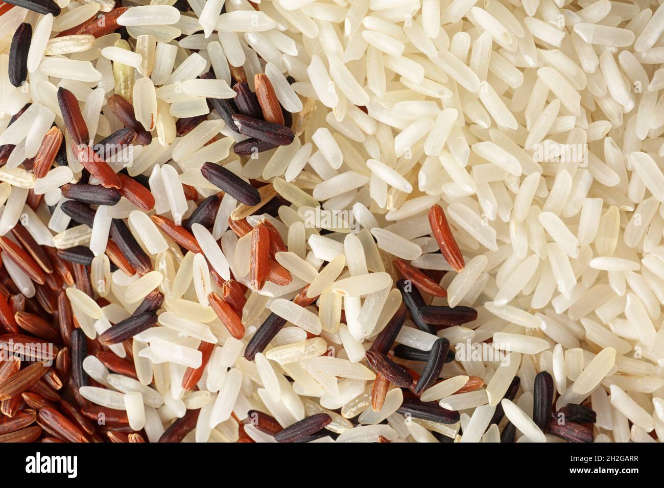 Brown and other types of rice as background, closeup Stock Photo - Alamy