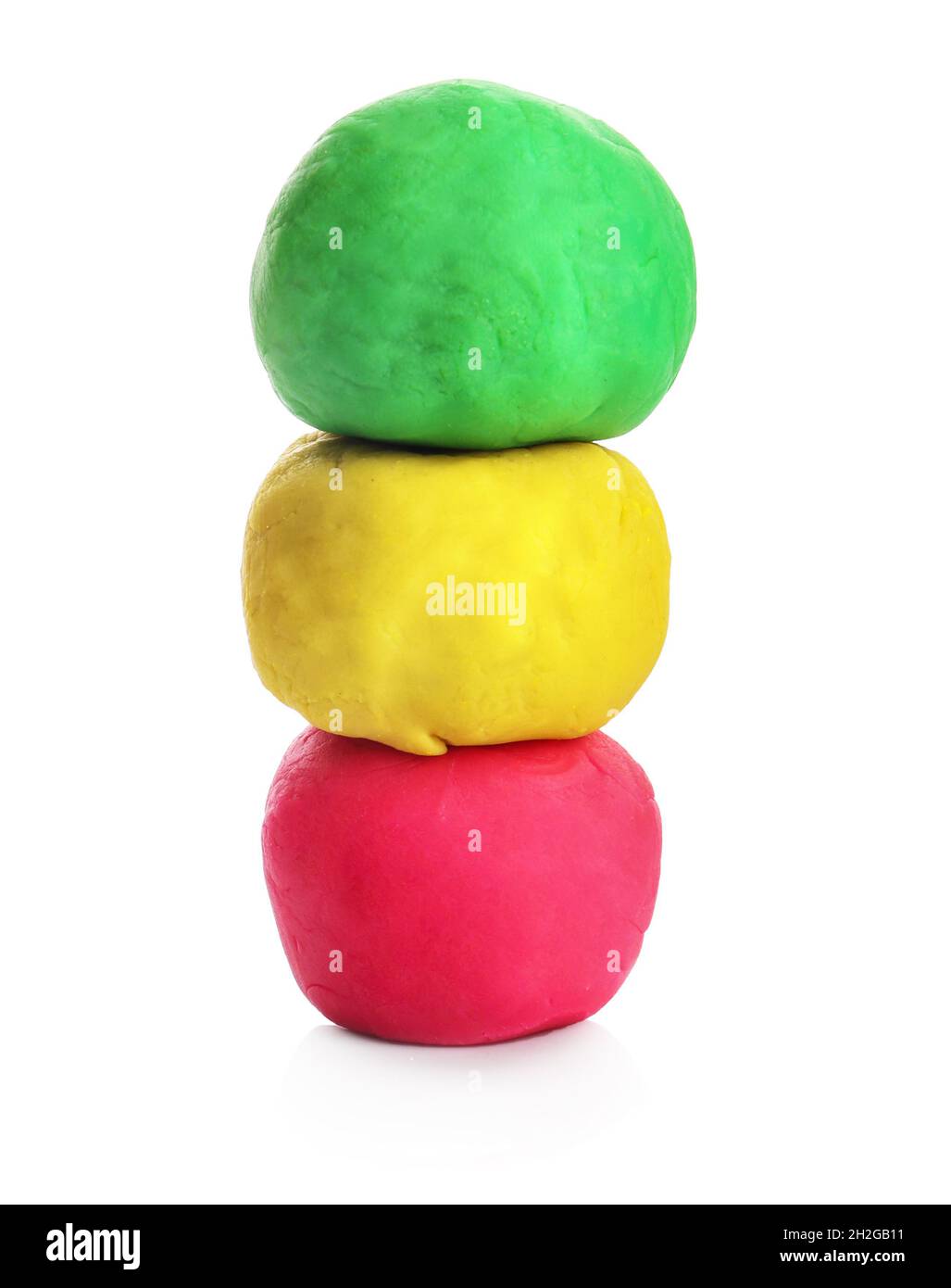 Colorful play dough on white background Stock Photo - Alamy