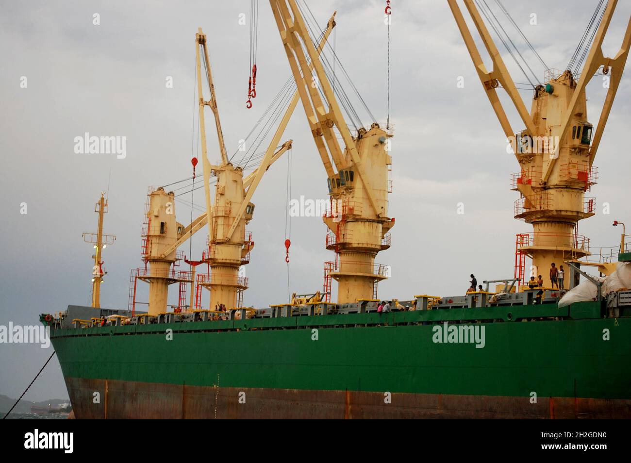 Freighter cargo ship floating in sea ocean wait queue transfer goods ...