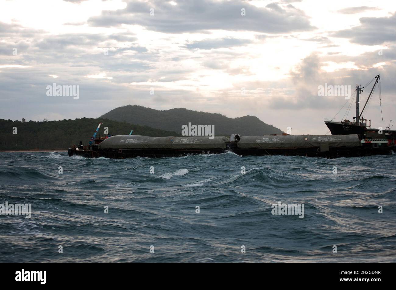 Freighter cargo ship floating in sea ocean wait queue transfer goods ...