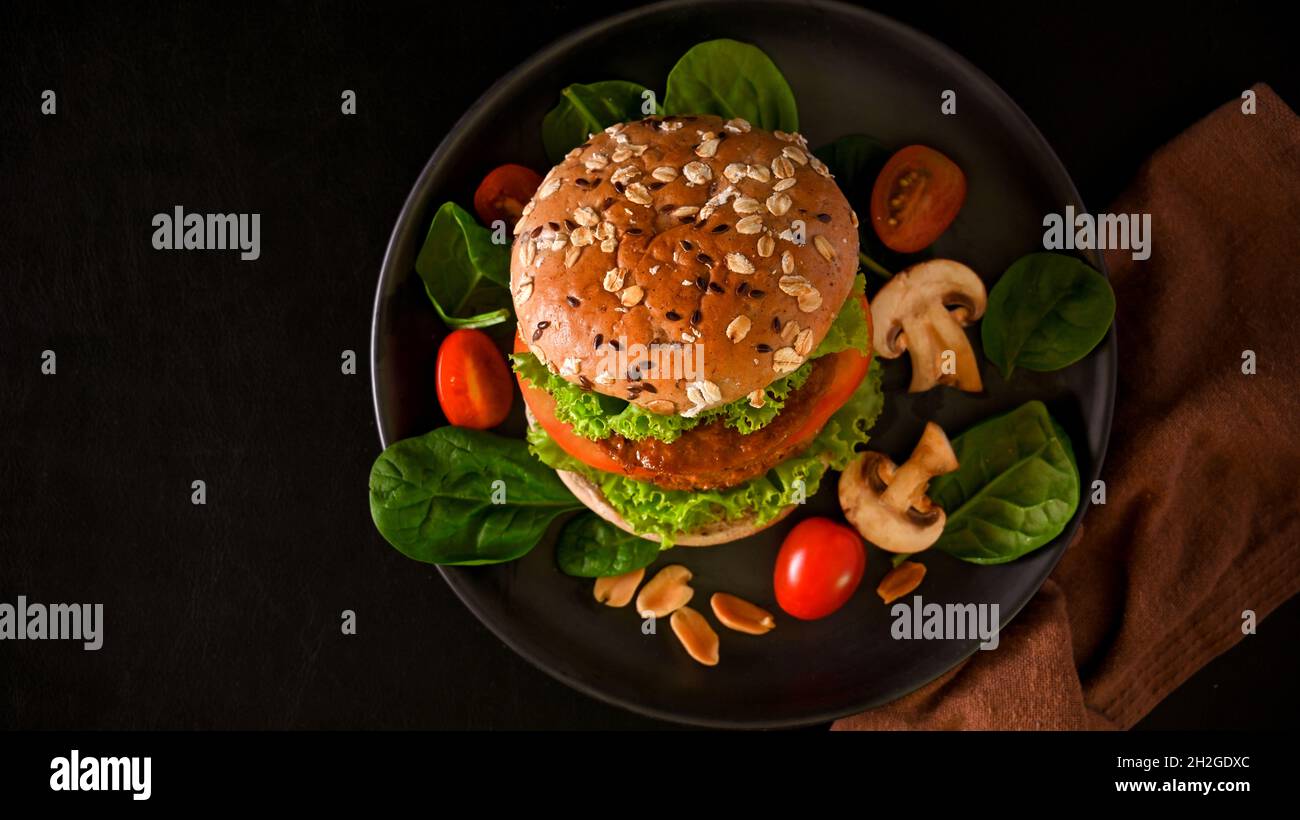 Top view, above view of a plate of Yummy vegan burger with whole grain ...