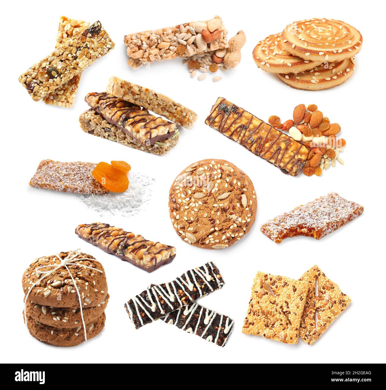Set with grain cereal bars and cookies on white background. Healthy ...