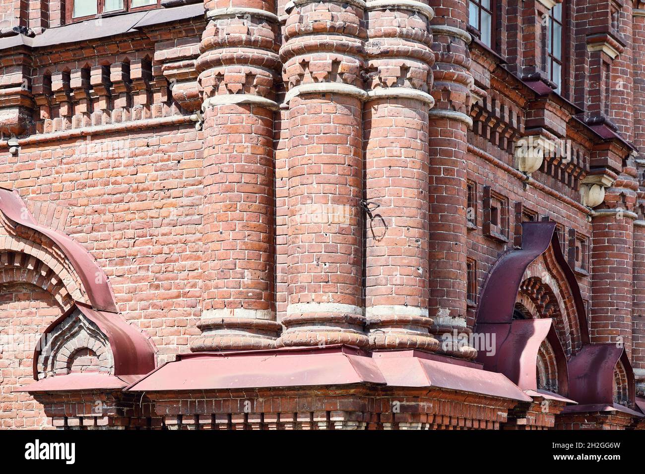 Wonderful historical building with red brick walls columns and high ...