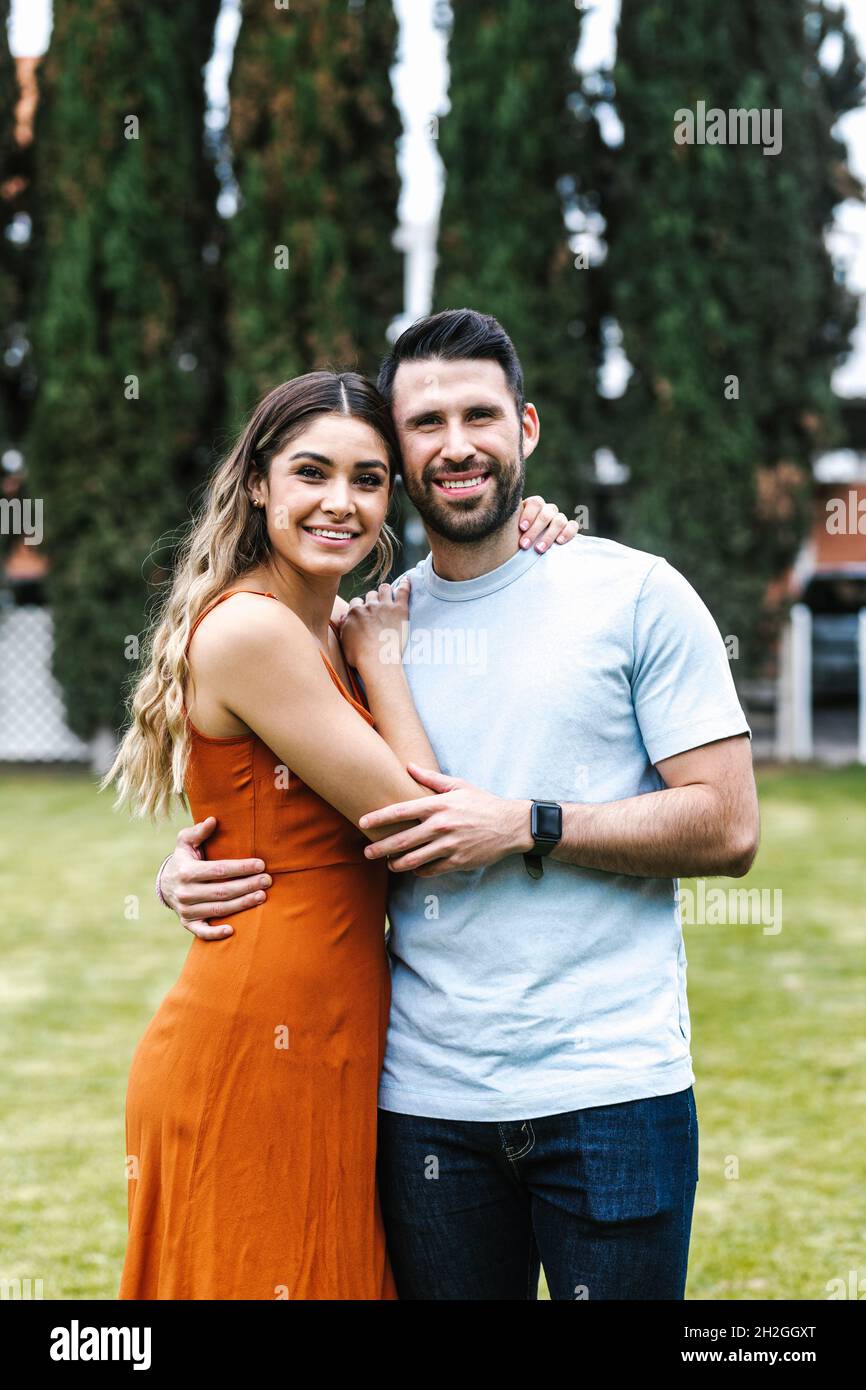 Young hispanic couple in love having fun and enjoying the beautiful ...