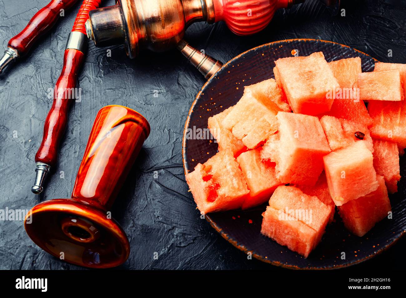 Tasty smoking hookah with watermelon flavored tobacco.Arabic shisha for ...