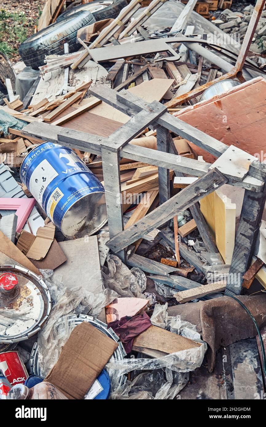 Izhevsk, Russia - July 16 2021: Waste products. Used paint cans on pile ...