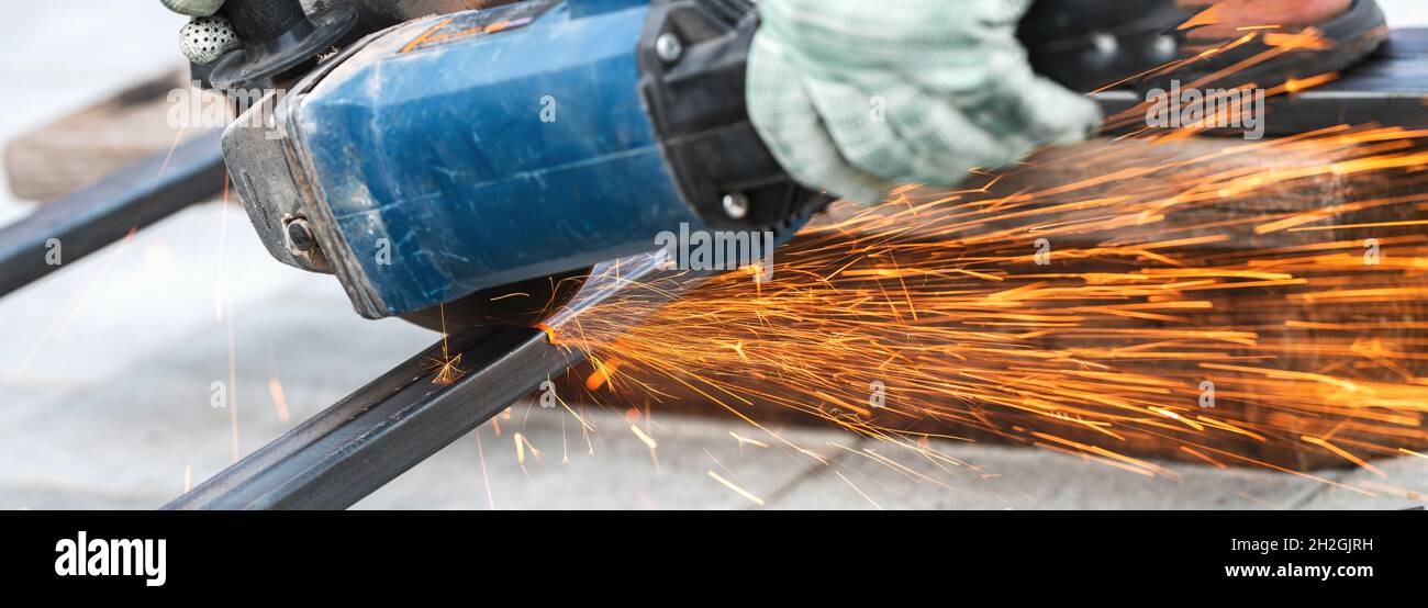 working with a circular saw cutting metal close-up Stock Photo - Alamy