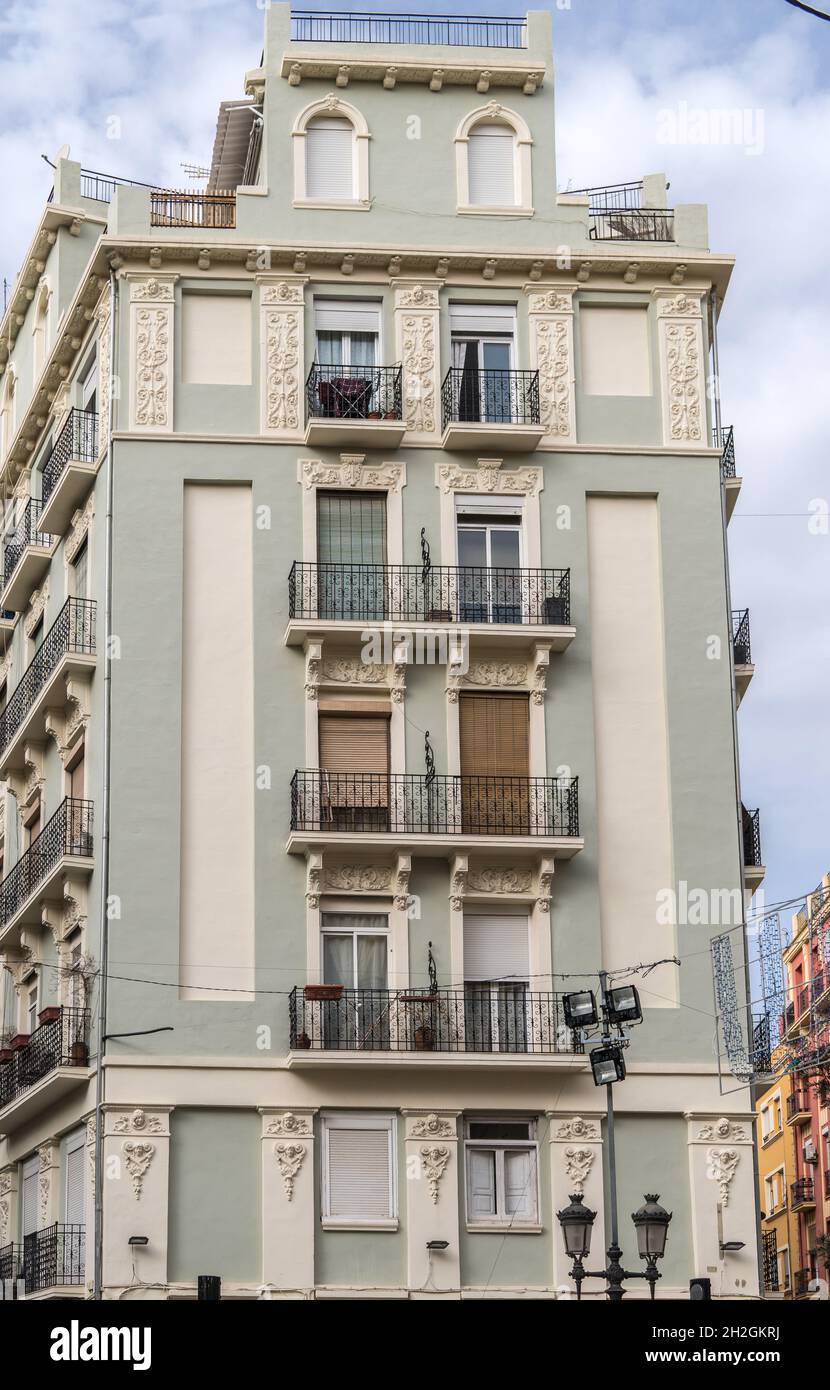 facade of a residential building at typical neighborhood, traditional ...