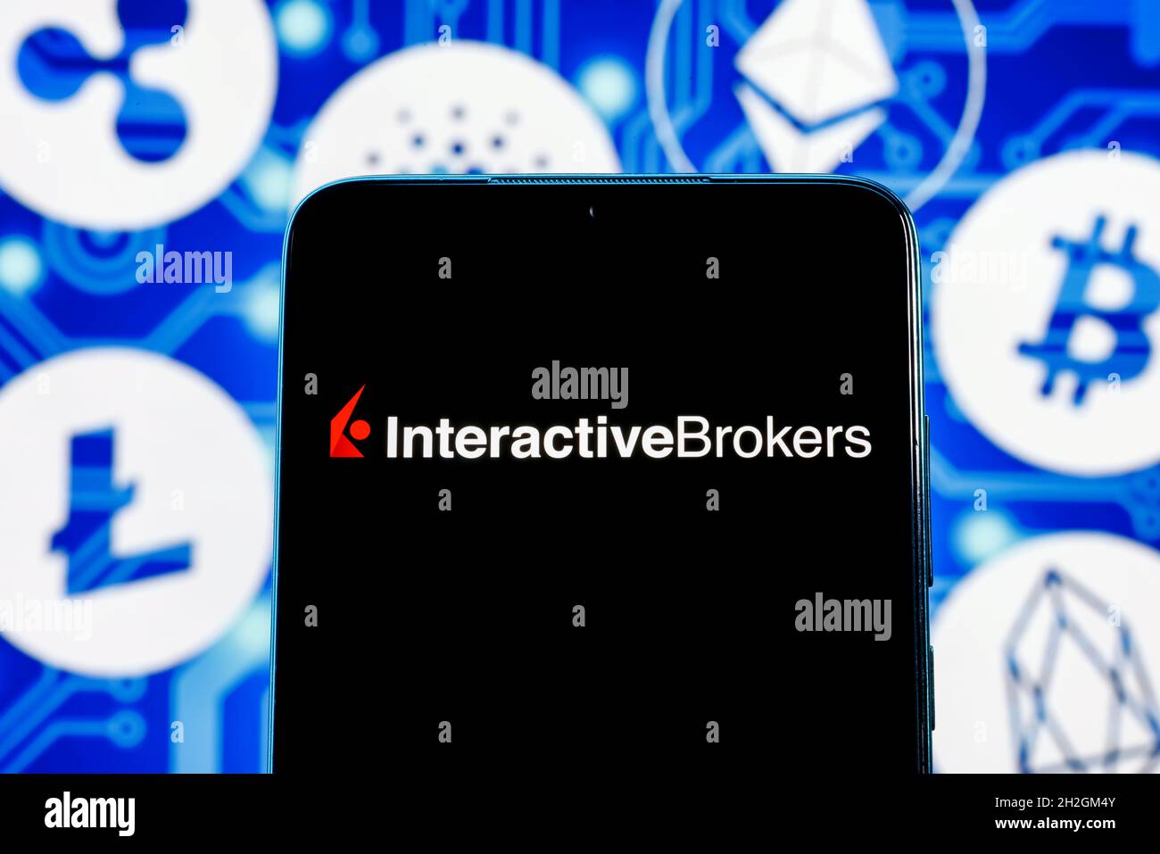 Interactive Broker logo on smartphone screen against the background of ...