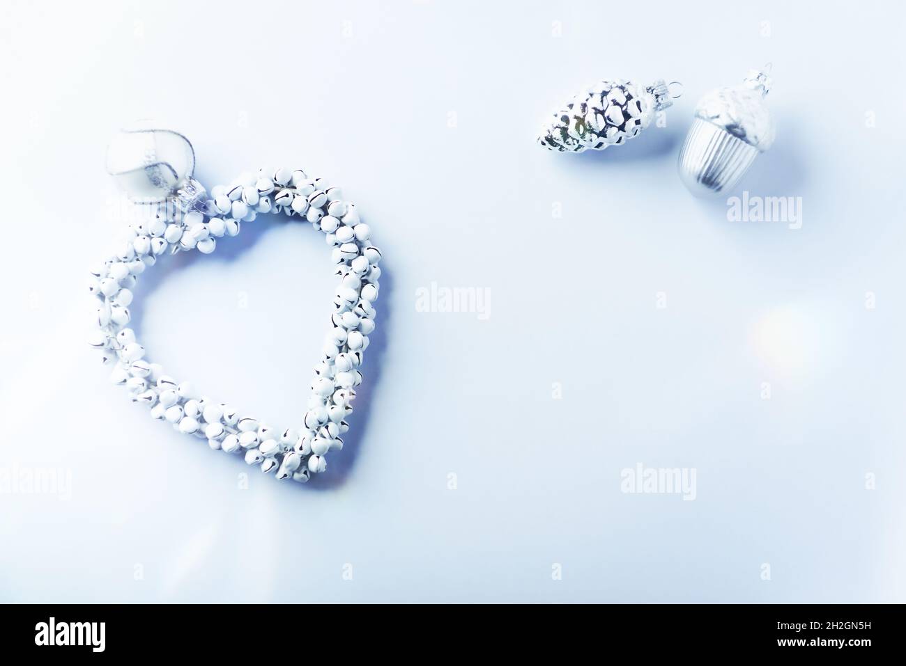 Christmas ornaments on bright paper background. Top view. Close up ...