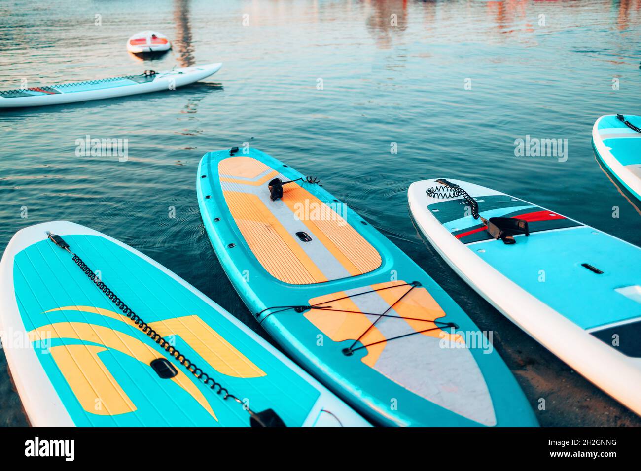 Yoga paddle board sunset hi-res stock photography and images - Alamy