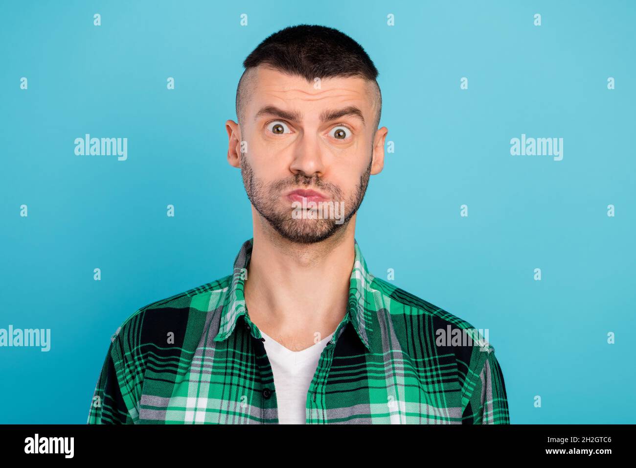 Photo of angry unhappy young man bad mood face cheeks blow air negative ...