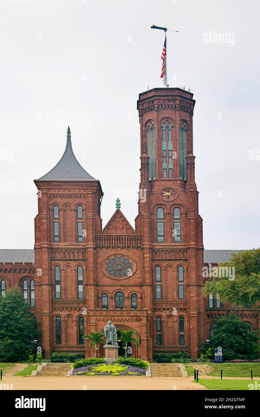 smithsonian institute building washington dc with a statue of joseph ...