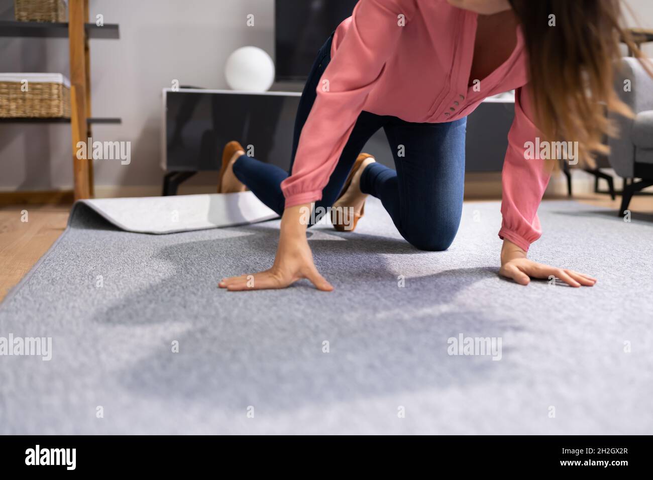 Woman Carpet Stumble Accident And Falldown In House Stock Photo - Alamy