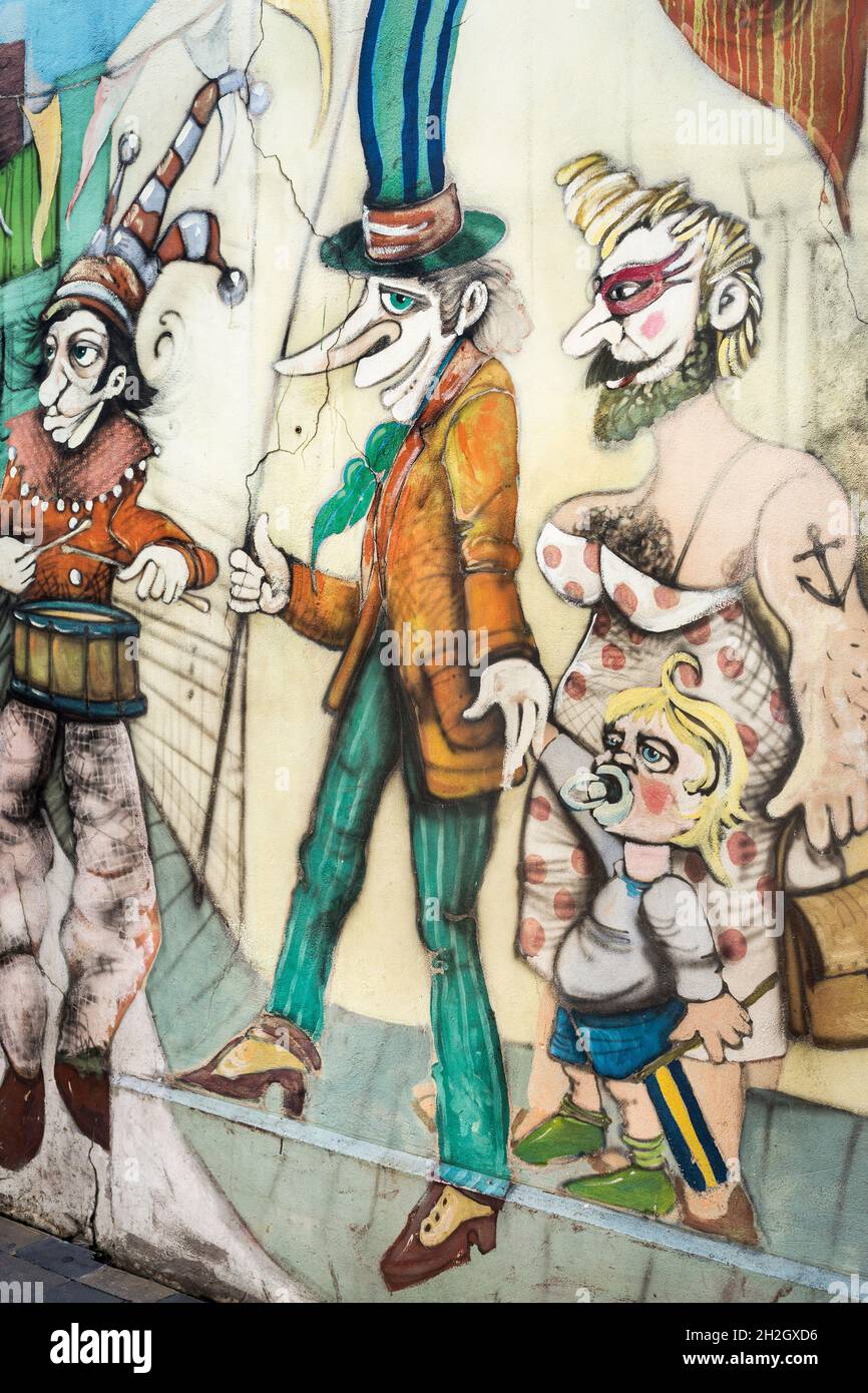 Vertical close-up view of a grotesque mural in La Boca neighborhood ...