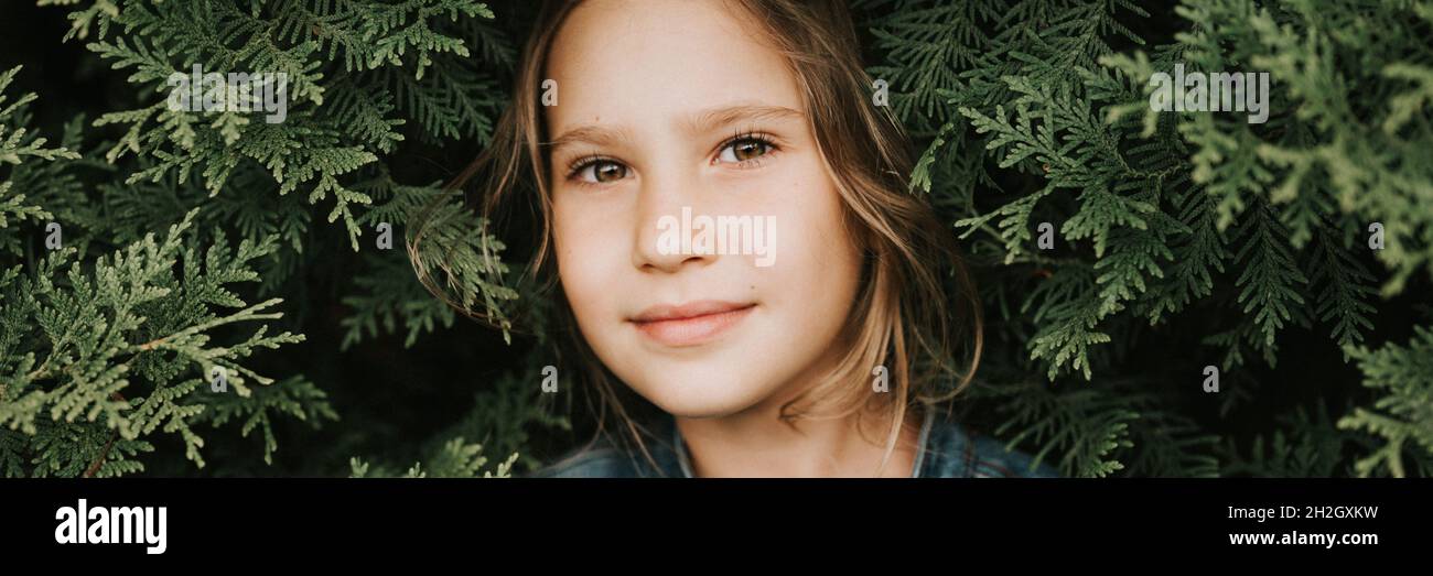 portrait of the face of a cute happy caucasian candid healthy eight ...