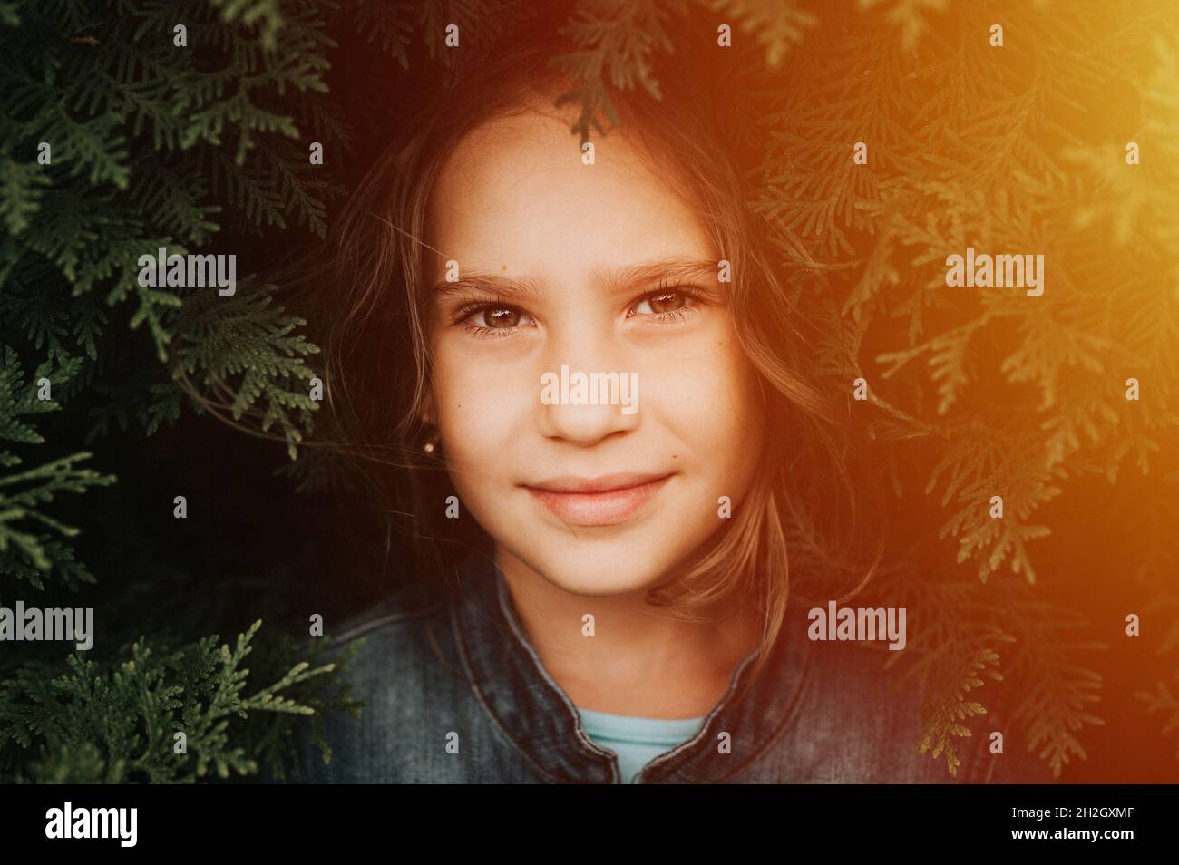 portrait of the face of a cute happy caucasian candid healthy eight ...