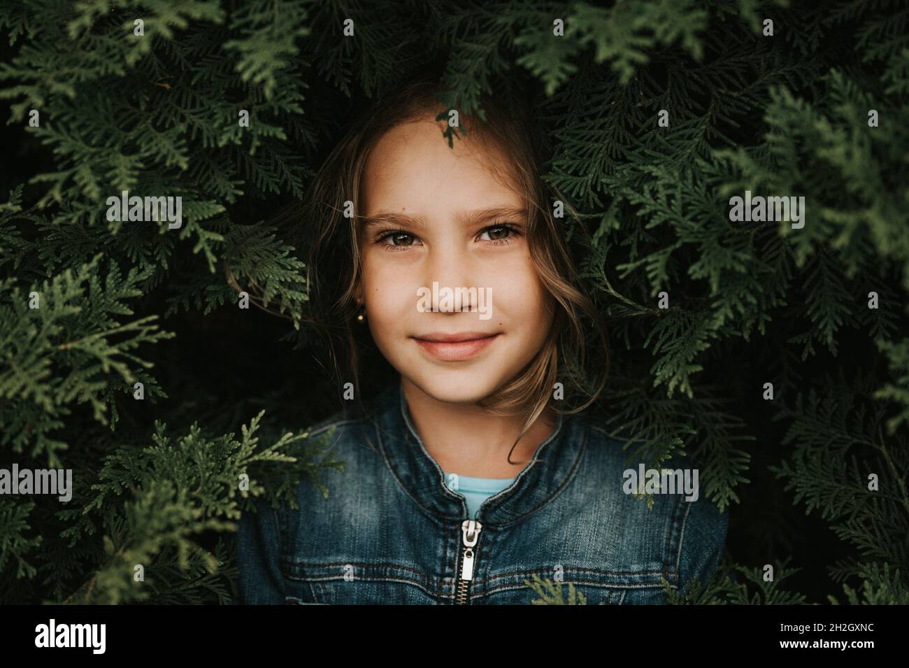 portrait of the face of a cute happy caucasian candid healthy eight ...