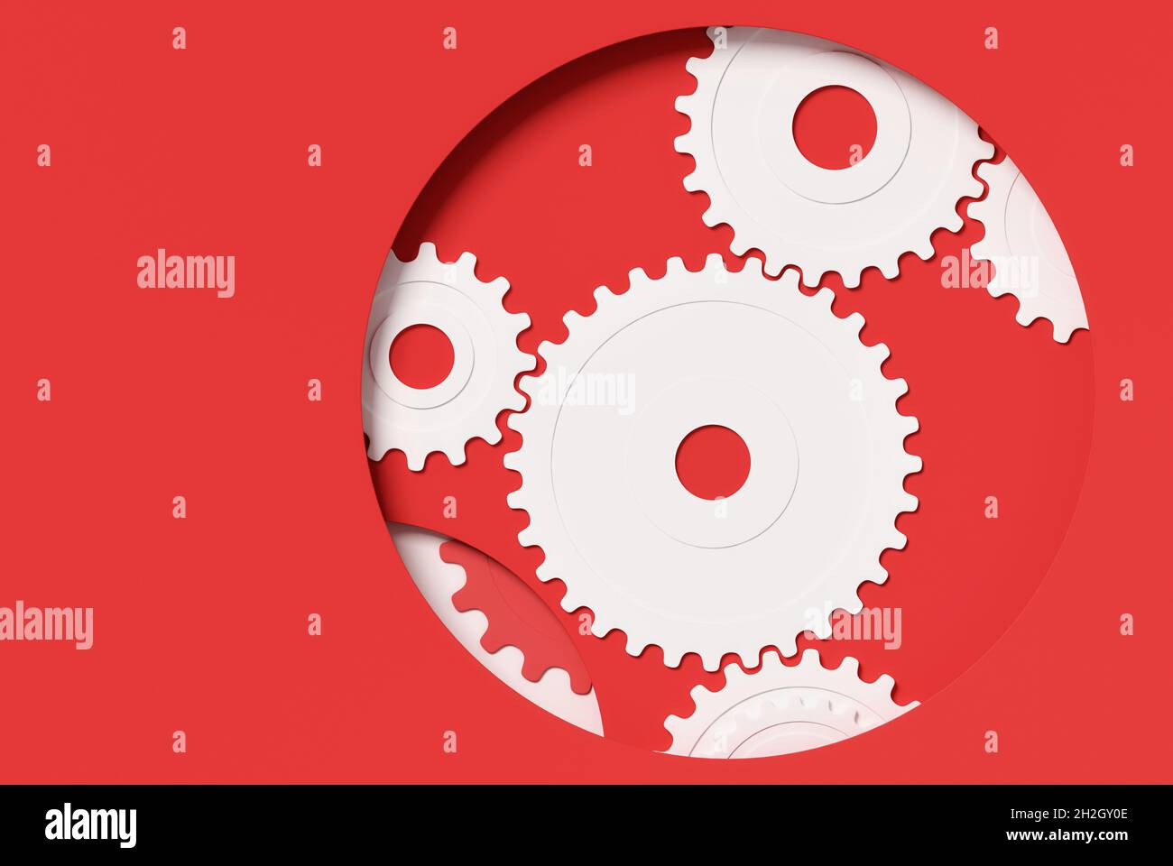 Many white gear cogs isolated on red background inside open circle ...