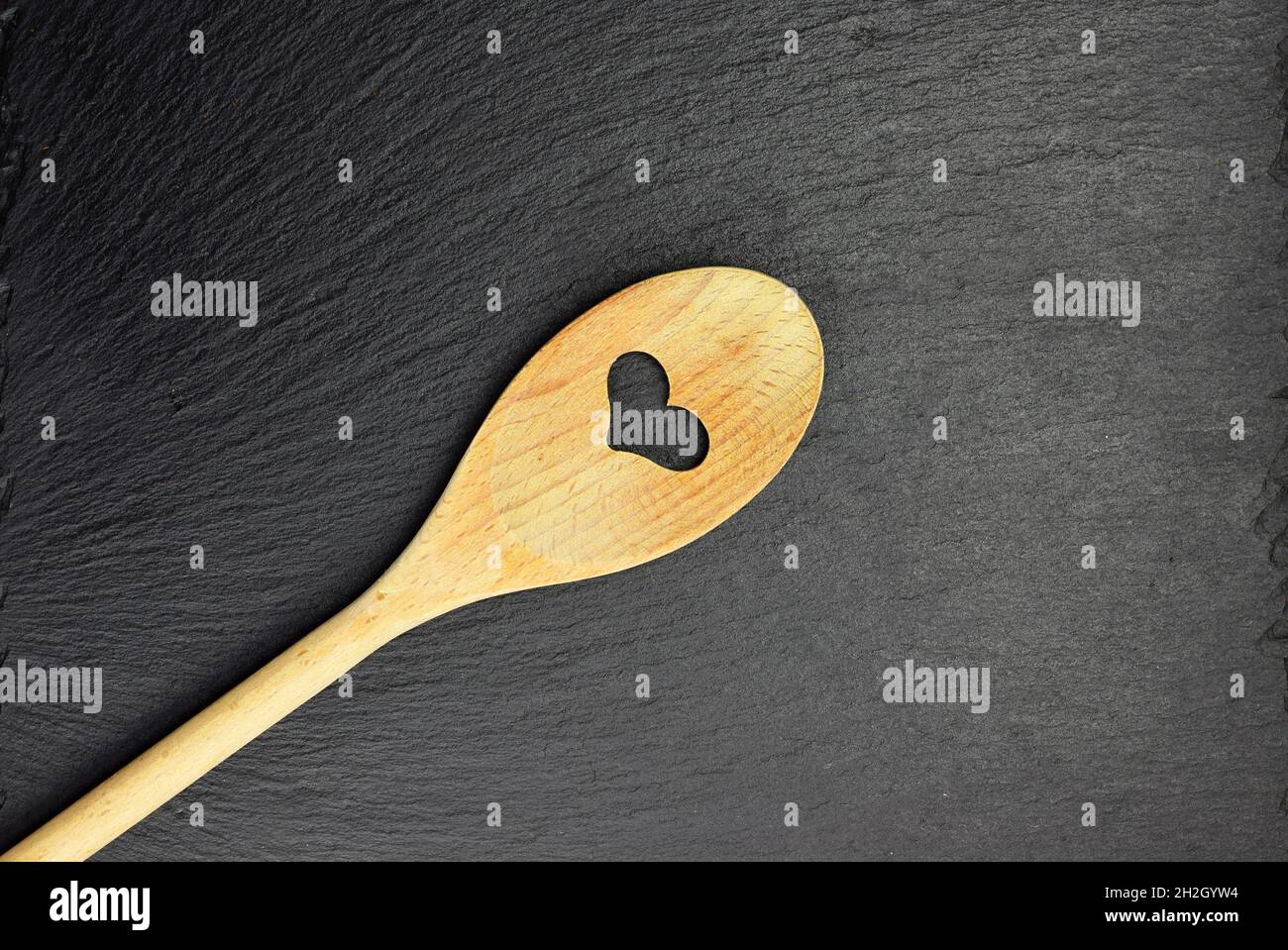 Wooden spoon on the table Stock Photo - Alamy