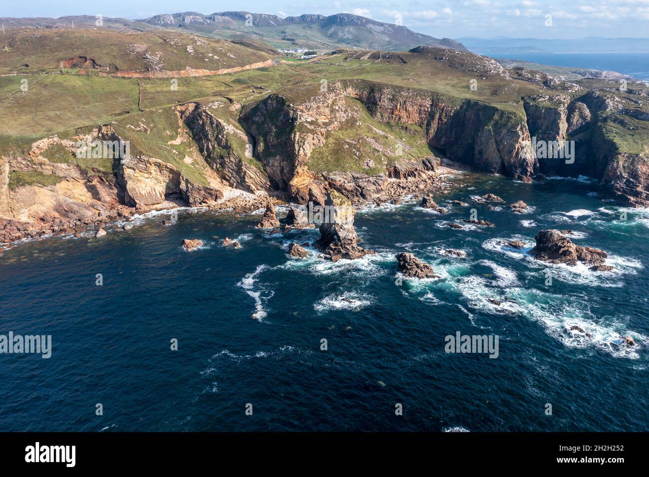 Aerial view of the rocks in the sea at Crohy Head Sea Arch, County ...