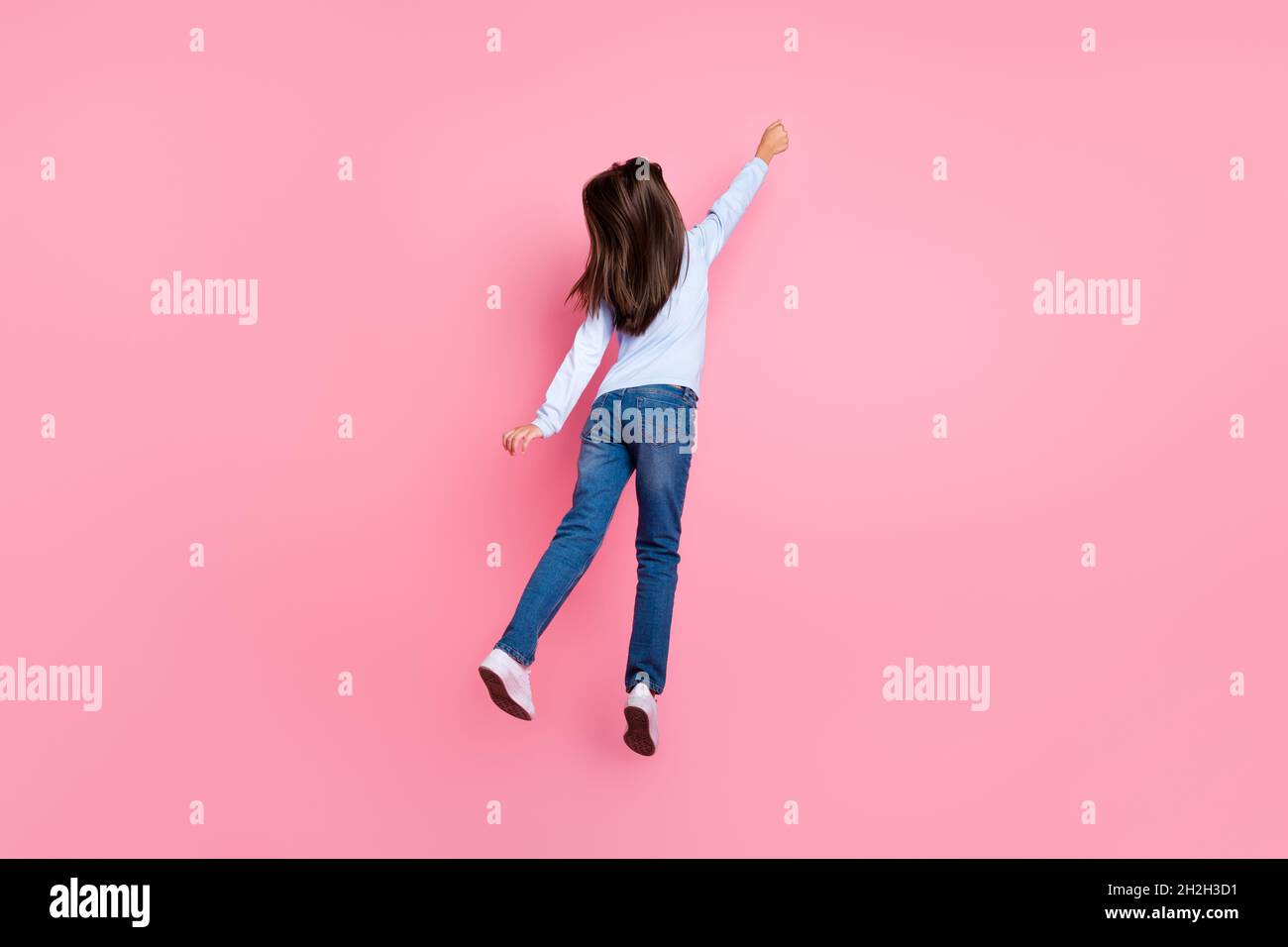 Rear back behind view full length body size of pretty girl jumping ...