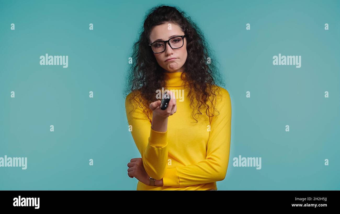 Positive woman tv remote controller hi-res stock photography and images ...