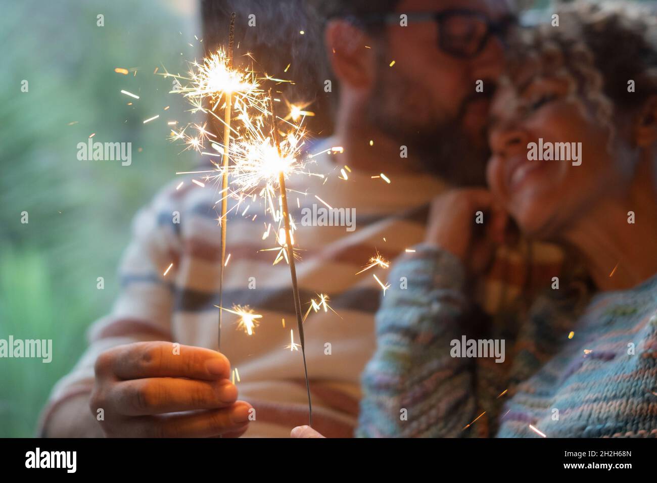 Couple kissing fire works hi-res stock photography and images - Alamy