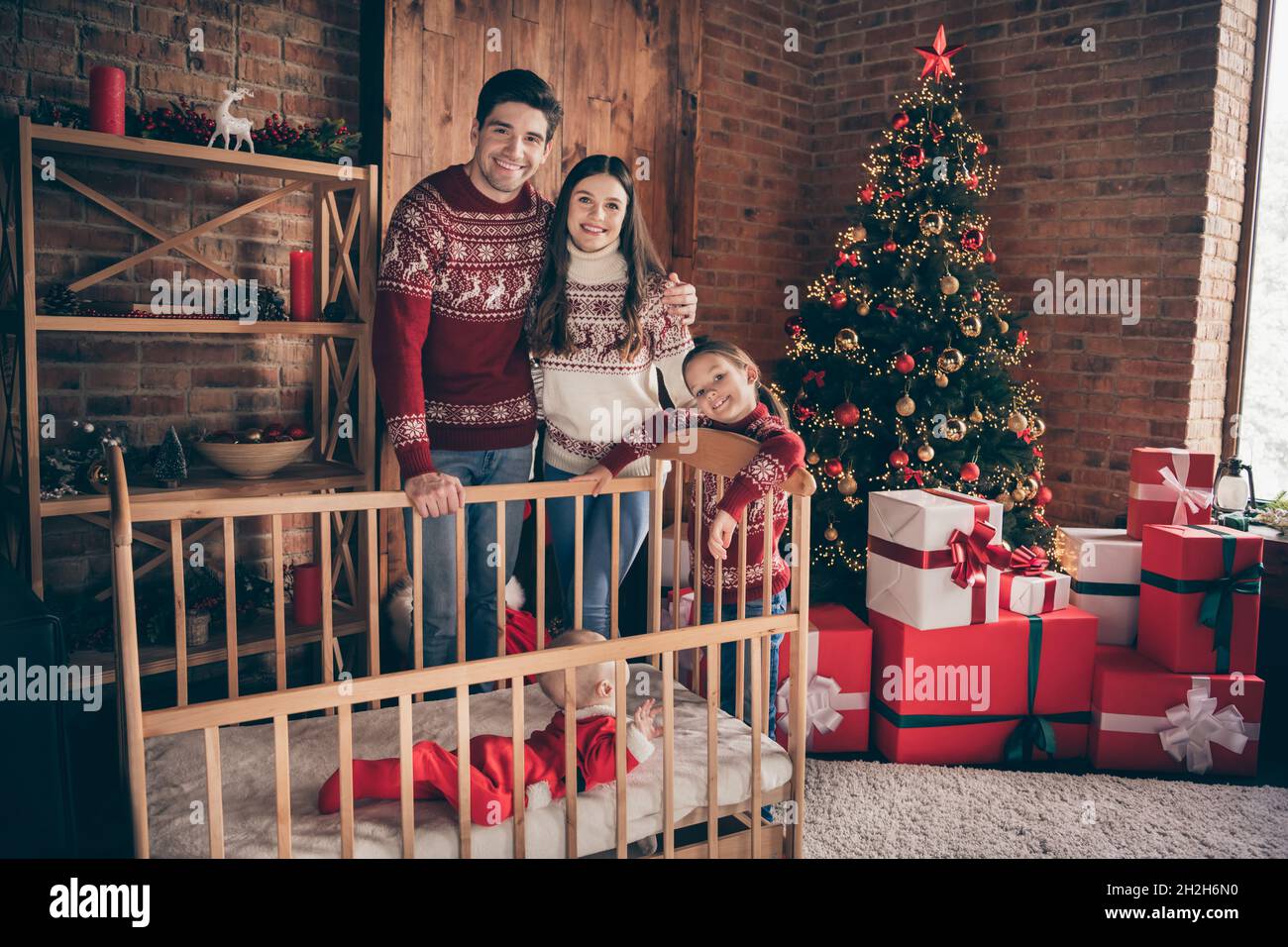 Photo of three people family cuddle each other care baby kid crib wear ...