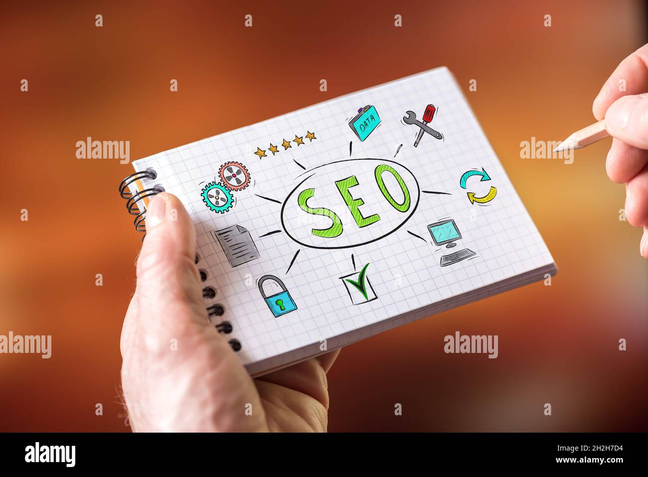 Hand drawing seo concept on a notepad Stock Photo - Alamy