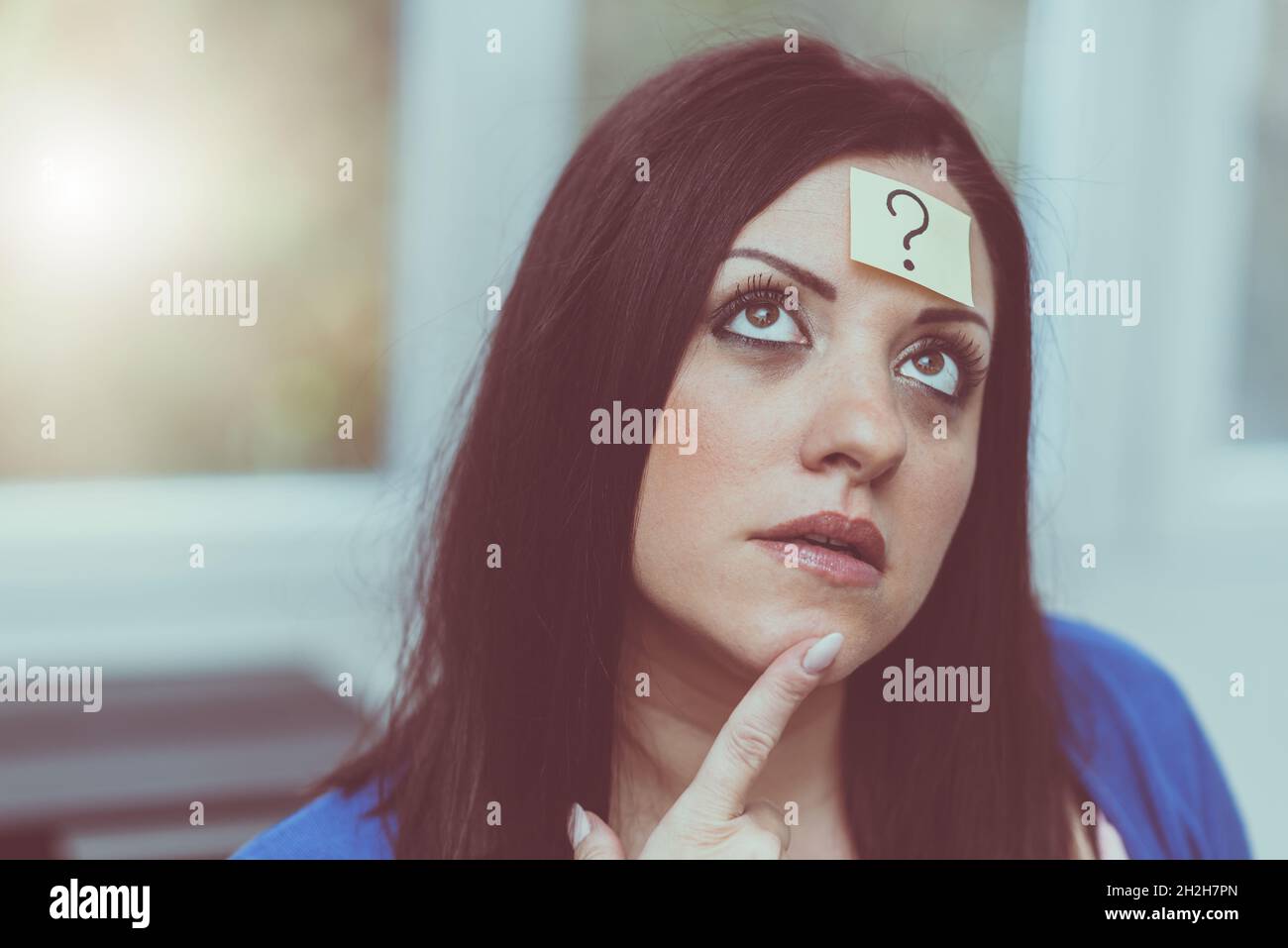 Woman question mark forehead hi-res stock photography and images - Alamy